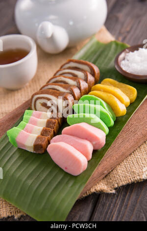 Getuk or food from cassava and coconut on a plate and banana leaf with ...