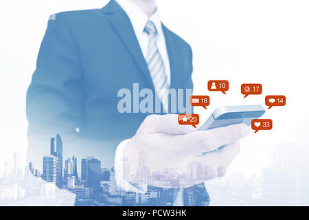 Digital icons and businessman using mobile phone in office. Concept of ...