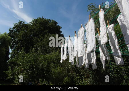 Environmentally friendly nappy inserts drying on a washing line Stock ...