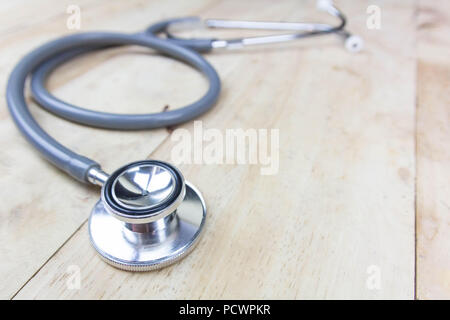 stethoscope put on wooden background with heart red color Stock Photo ...