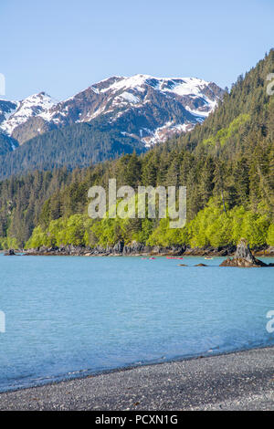 Ocean kayakers in Resurrecton in Bay off Lowell Point in Seward Alaska ...