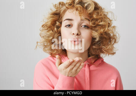 Teen girl puckering lips, portrait Stock Photo - Alamy