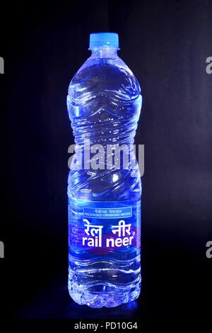 Stock image of purified water bottle over white background. water in ...