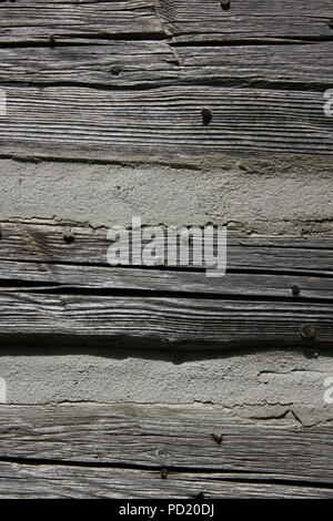Vintage log cabin homestead with mud infill Stock Photo - Alamy
