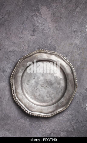 Vintage empty round metal plate top view isolated Stock Photo - Alamy