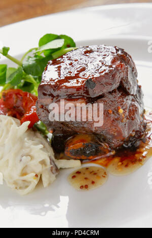 plated beef rib meal Stock Photo - Alamy