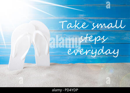 Take small steps every day symbol. Wooden blocks with words Take small ...