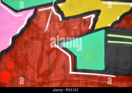 Some elements of a large and composite graffiti pattern on the wall ...