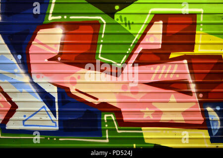 Some elements of a large and composite graffiti pattern on the wall ...