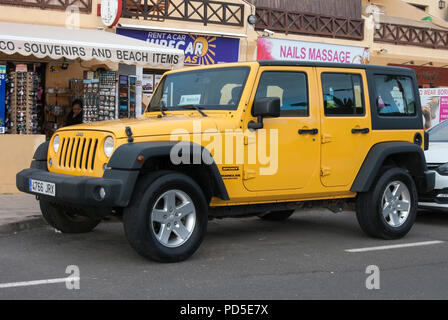 4 door yellow Jeep Wrangler Unlimited Rubicon Stock Photo - Alamy