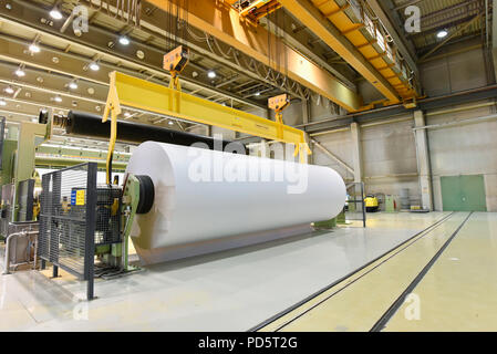 machines for the production of paper rolls for further processing in a ...