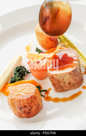 plated pork loin dinner Stock Photo - Alamy