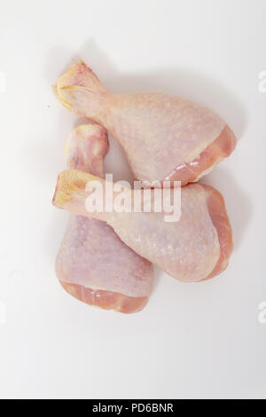 Trimmed raw chicken on a white background Stock Photo - Alamy
