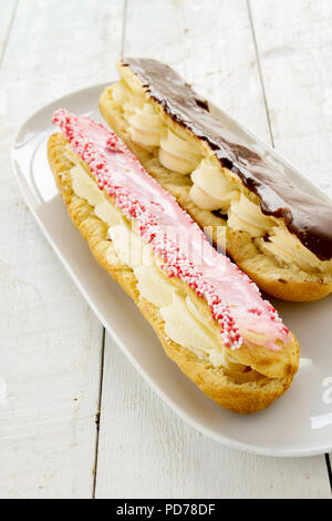 larger chocolate eclair pastries Stock Photo - Alamy