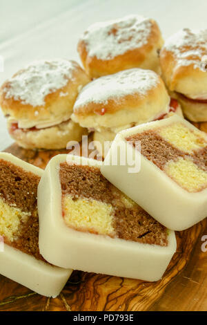 home baked battenberg cake and scones on wooden platter Stock Photo - Alamy