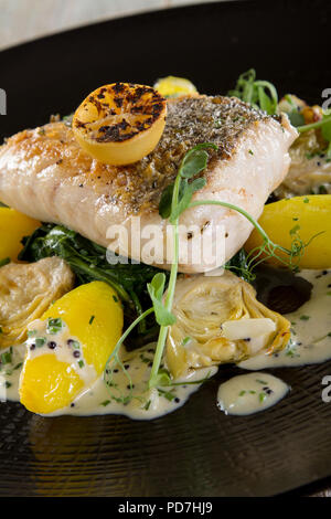 plated fish cod loin main meal Stock Photo - Alamy