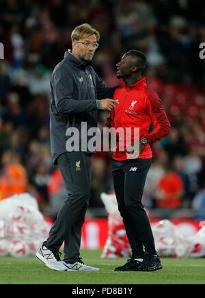 Liverpool Manager Jurgen Klopp congratulates Jordan Henderson after ...