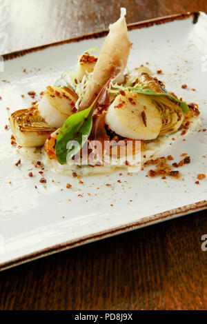 pan fried scallops plated meal appetizer starter Stock Photo - Alamy