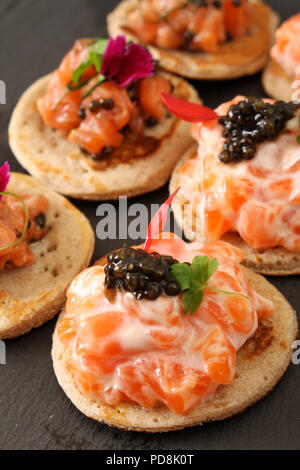 smoked salmon blinis canapes Stock Photo - Alamy