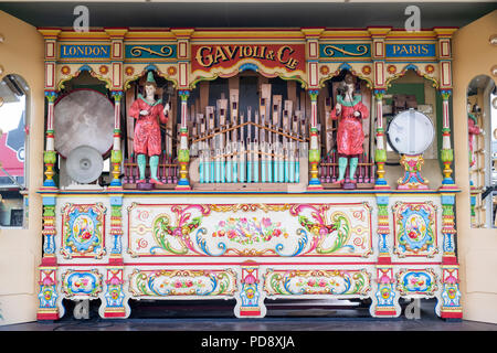Traditional victorian steam powered colourful carousel fairground ...