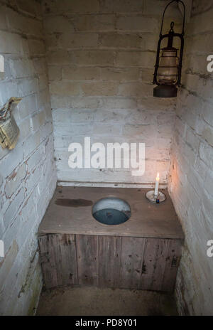 Non-flushing outside toilet in wooden hut Stock Photo - Alamy