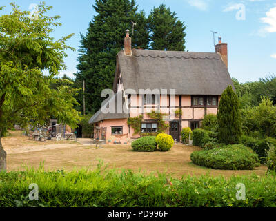 A pink painted thatched cottage in a quiet village Bremhill near ...