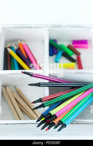 black boxs and pen on blue paper in strip Stock Photo - Alamy