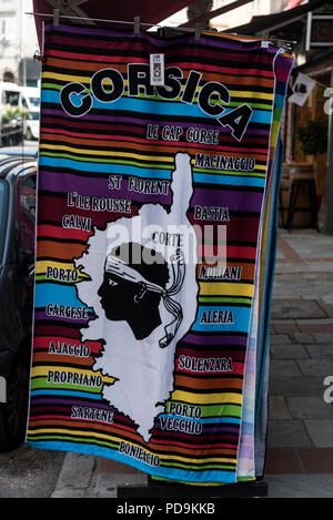 Souvenir beach towel of the Moor's head that appears on Corsica's flag ...