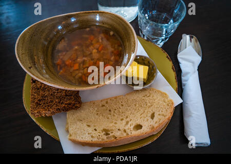 Traditional Icelandic lamb soup, bread and butter, summer time, indoor ...