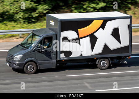 Mercedes-Benz Sprinter of Sixt on motorway. Sixt SE is a European ...