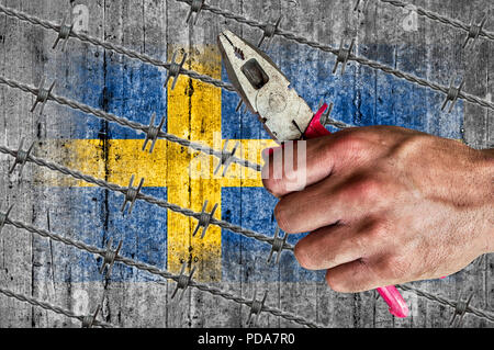 Sweden flag and barb wire with pliers Stock Photo - Alamy