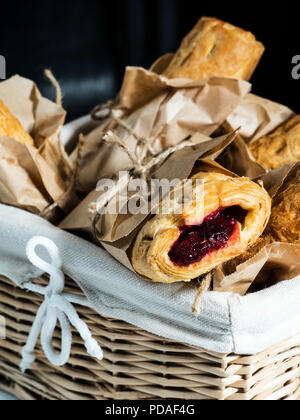 rolls of puff pastry with fruit jam Stock Photo - Alamy