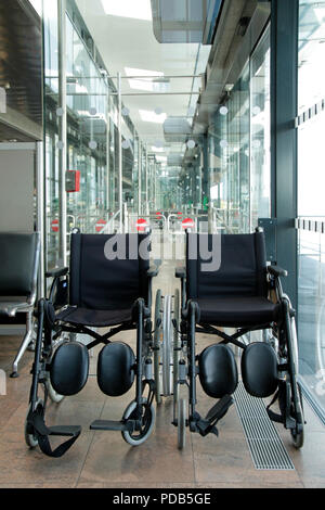 Empty wheelchair for disabled special needs travel passengers on ...