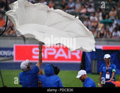 Athletics stadium in rainy weather, sport wallpaper Stock Photo - Alamy