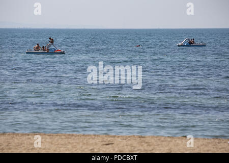 Perea, Thessaloniki, Greece. 7th Aug, 2018. A woman is seen sitting in ...