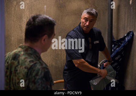 Ernest Hoopii, the Infantry Immersion Trainer Site Lead, shows an ...