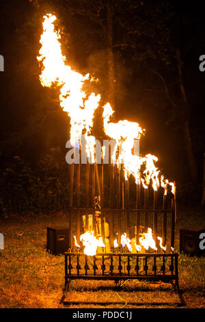 Pyrophone fire organ at night playing music trance Stock Photo - Alamy