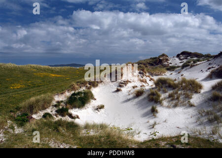 sand dune against dark sky;clachan sands;machair;north uist;scotland ...