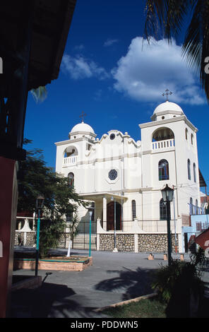 FLORES, GUATEMALA - Catholic church in colonial village of Flores Stock ...