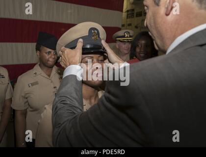 A frocking ceremony for Hospital Corpsman Master Chief Crystal Ingram ...