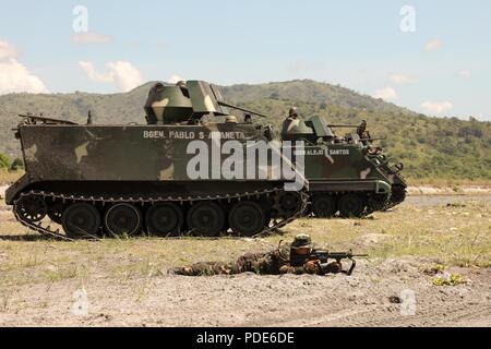 Philippine Army M113 armored personnel carriers are staged at the end ...
