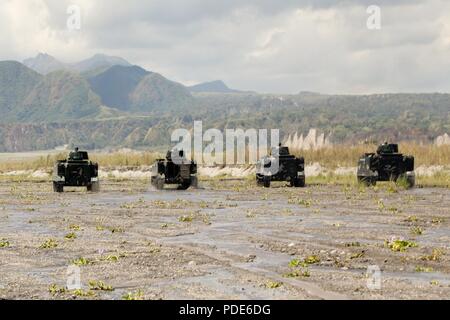 Philippine Army M113 armored personnel carriers are staged at the end ...