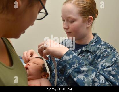 US Navy Hospital Corpsman smiles proudly after reciting the Oath of ...