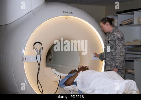 US Navy Medical Technologist assigned to the David R. Ray Health Center ...