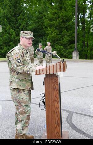 Col. John Dreska, outgoing 1st Brigade commander (right), passes the ...