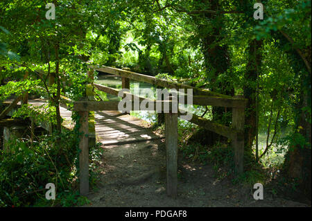 Ford and pedestrian footbridge over the River Stiffkey at Great ...