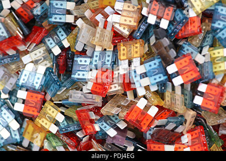 Bunch of color coded automotive fuses Stock Photo - Alamy