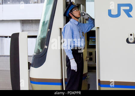 Japanese train conductor working on the bullet train (shinkansen Stock ...