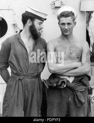 Crewmen of the Australian Navy ship HMAS Newcastle prepare to secure ...