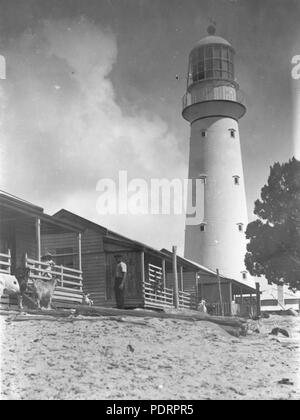 Sandy Cape lighthouse seen from the front of the lighthouse keepers ...